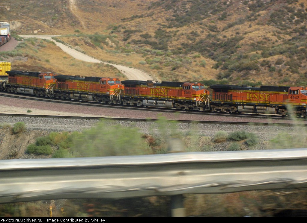 4 engines leading a BNSF train down Cajon Pass